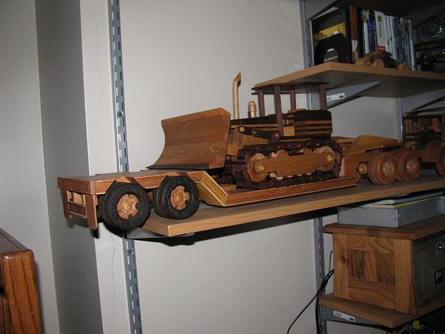 My first try at building a bull dozer with tracks - Woodworking Project ...